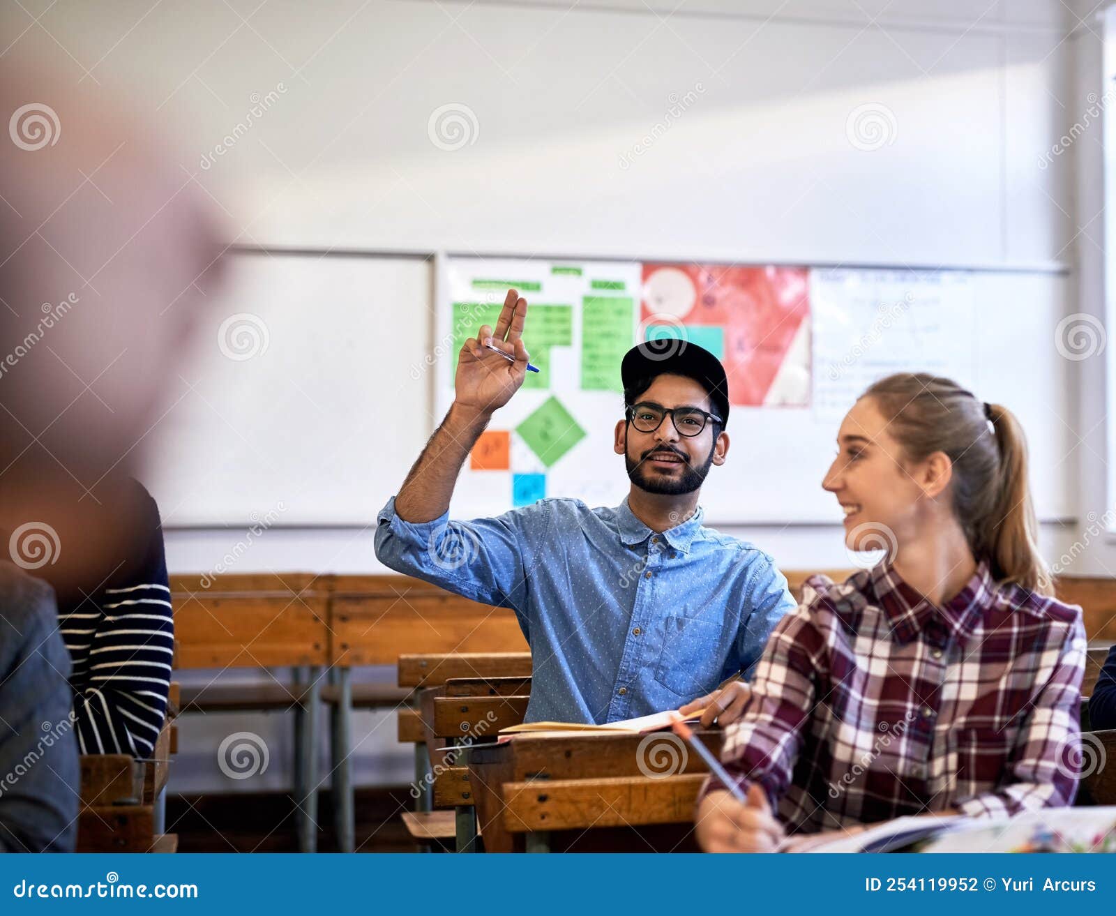 He Knows the Answer. an University Student Hand Raised in Class. Stock ...
