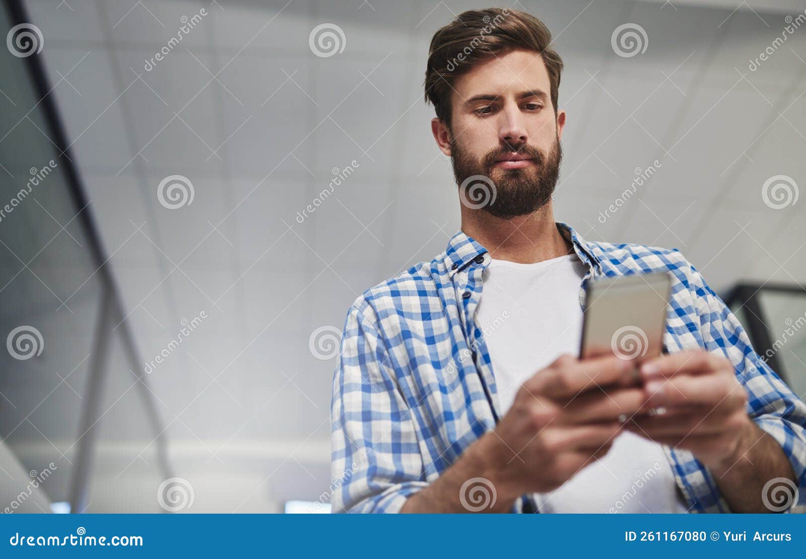 He Knows How To Make Technology Work for Him. a Young Designer Using a ...