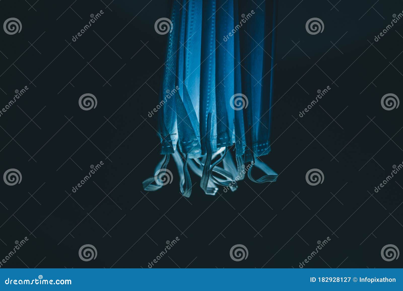A Group of Blue Mask Hanging from the String Stock Image - Image of ...