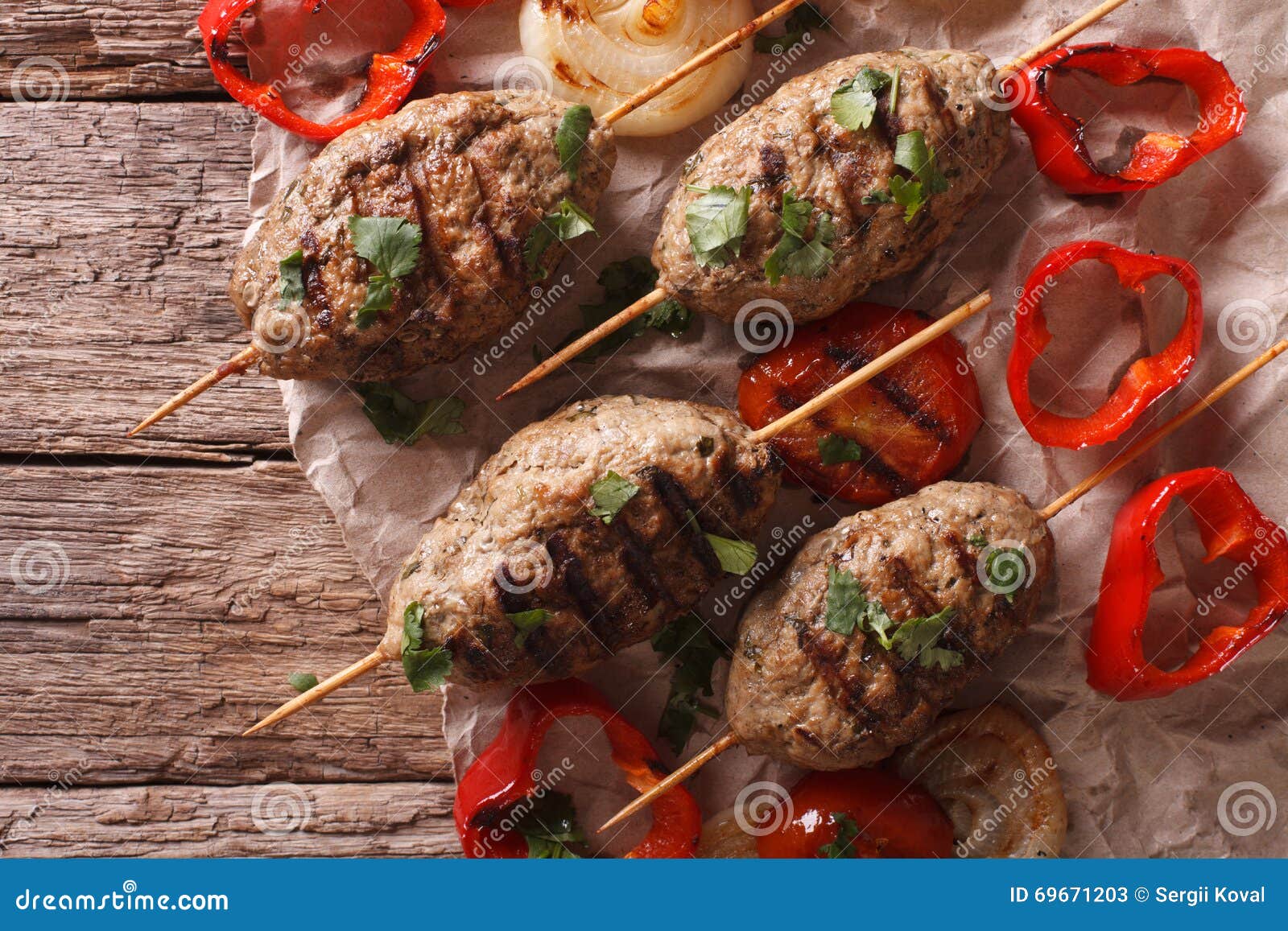 Kofta Kebab with Grilled Vegetables Close-up on the Table. Horizontal ...