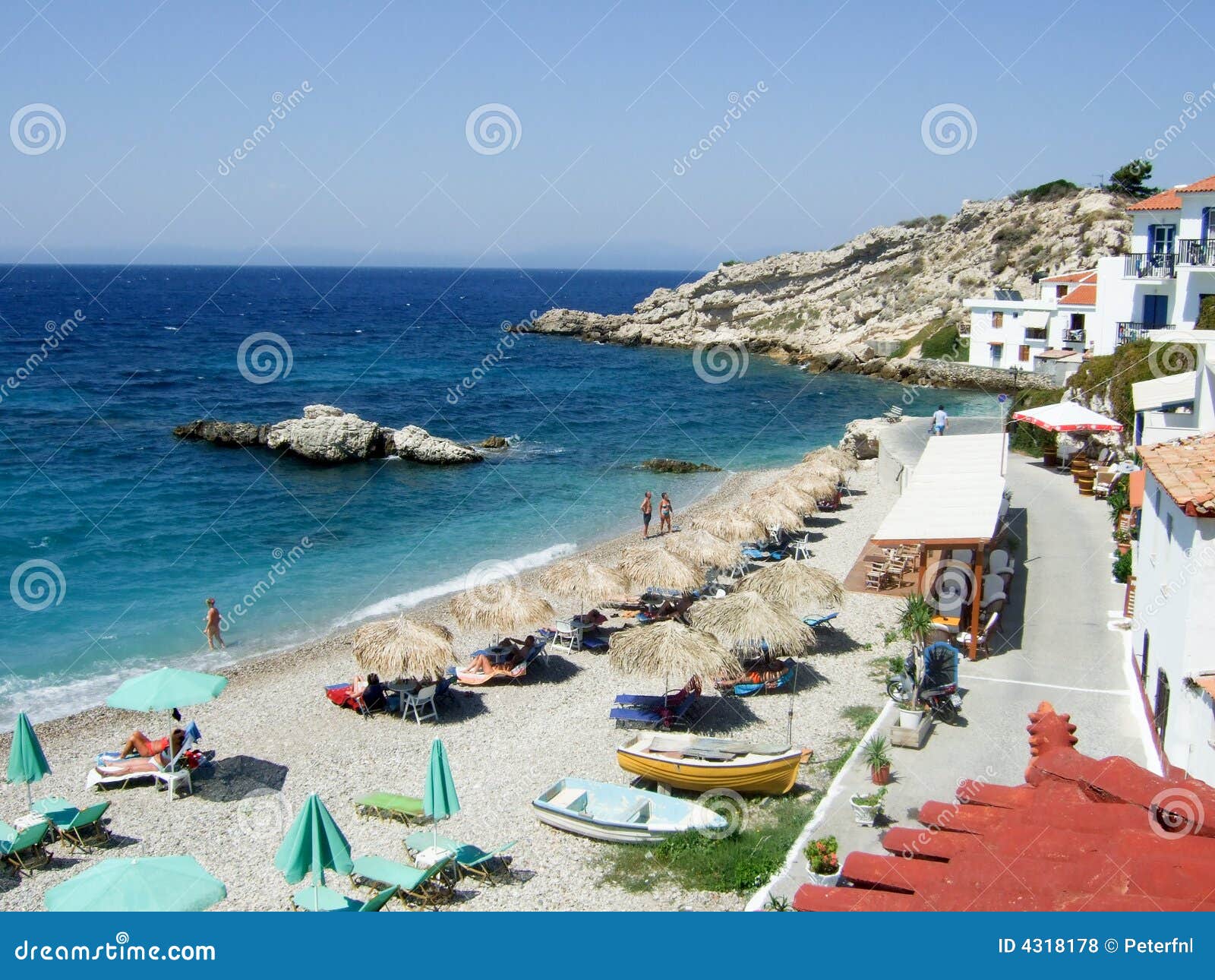 Kokkari beach, Greece stock photo. Image of boat, umbrella - 4318178