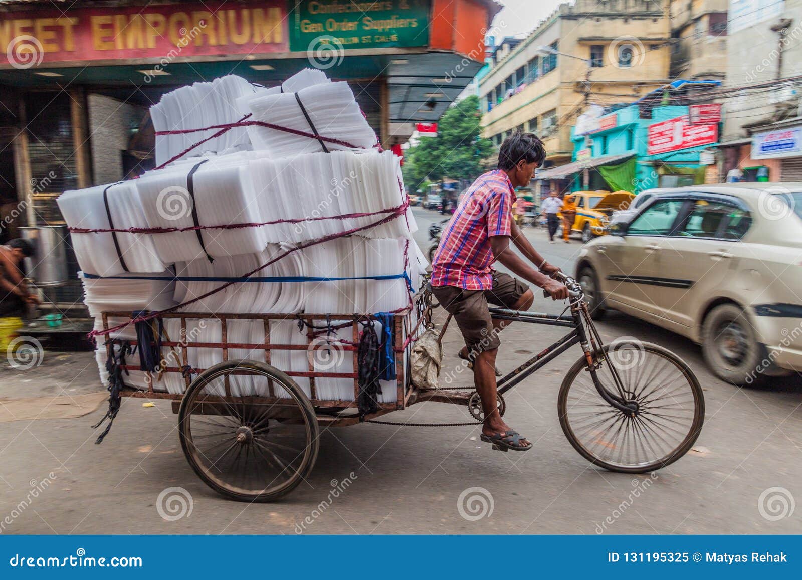 KOLKATA, INDIA - OCTOBER 27, 2016: Cargo Cyclo Rickshaw in the Center ...