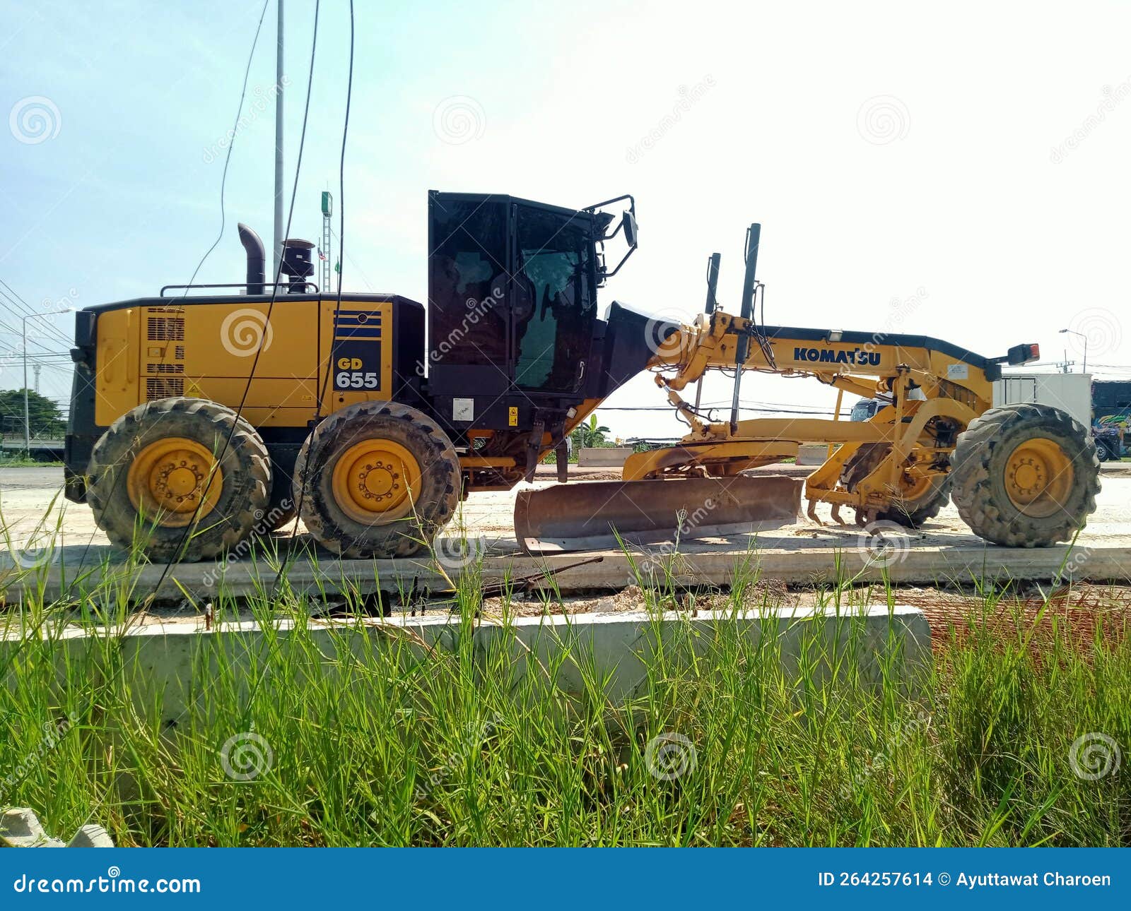 Motor Grader On Road Construction. Orange Bulldozer On Bridge Road ...