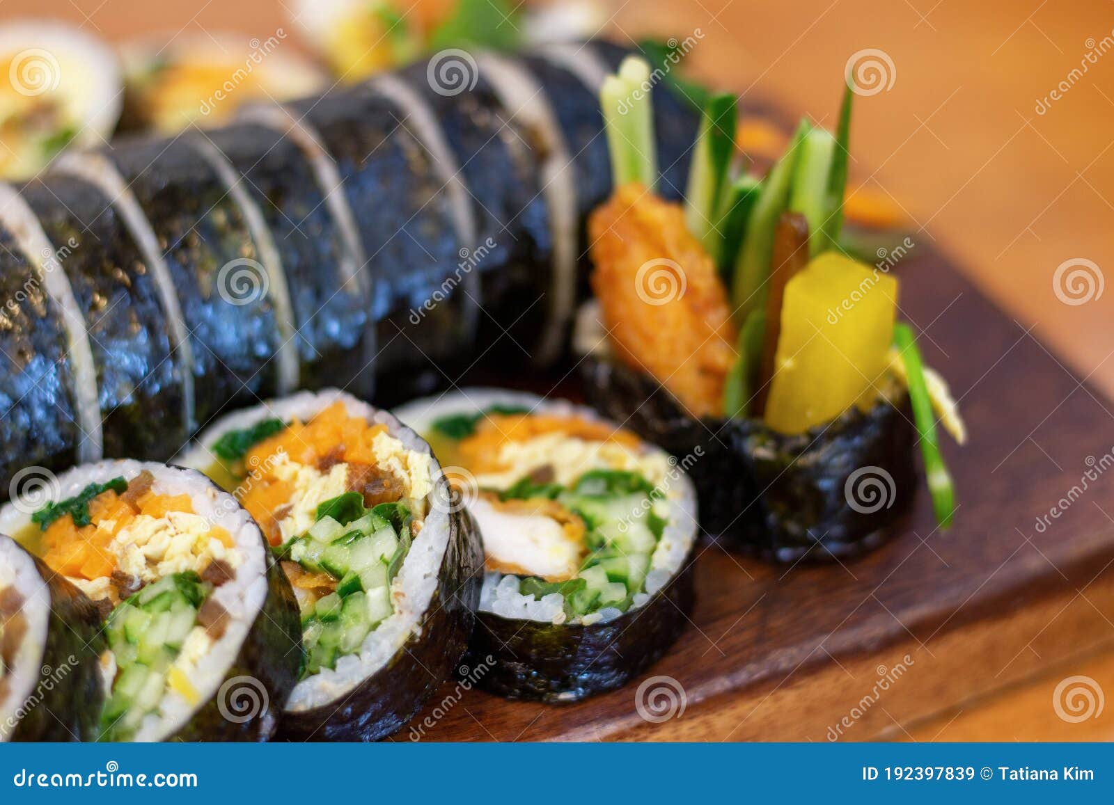 Korean Kimbab Rolls with Vegetables and Chicken on Board, Side View ...
