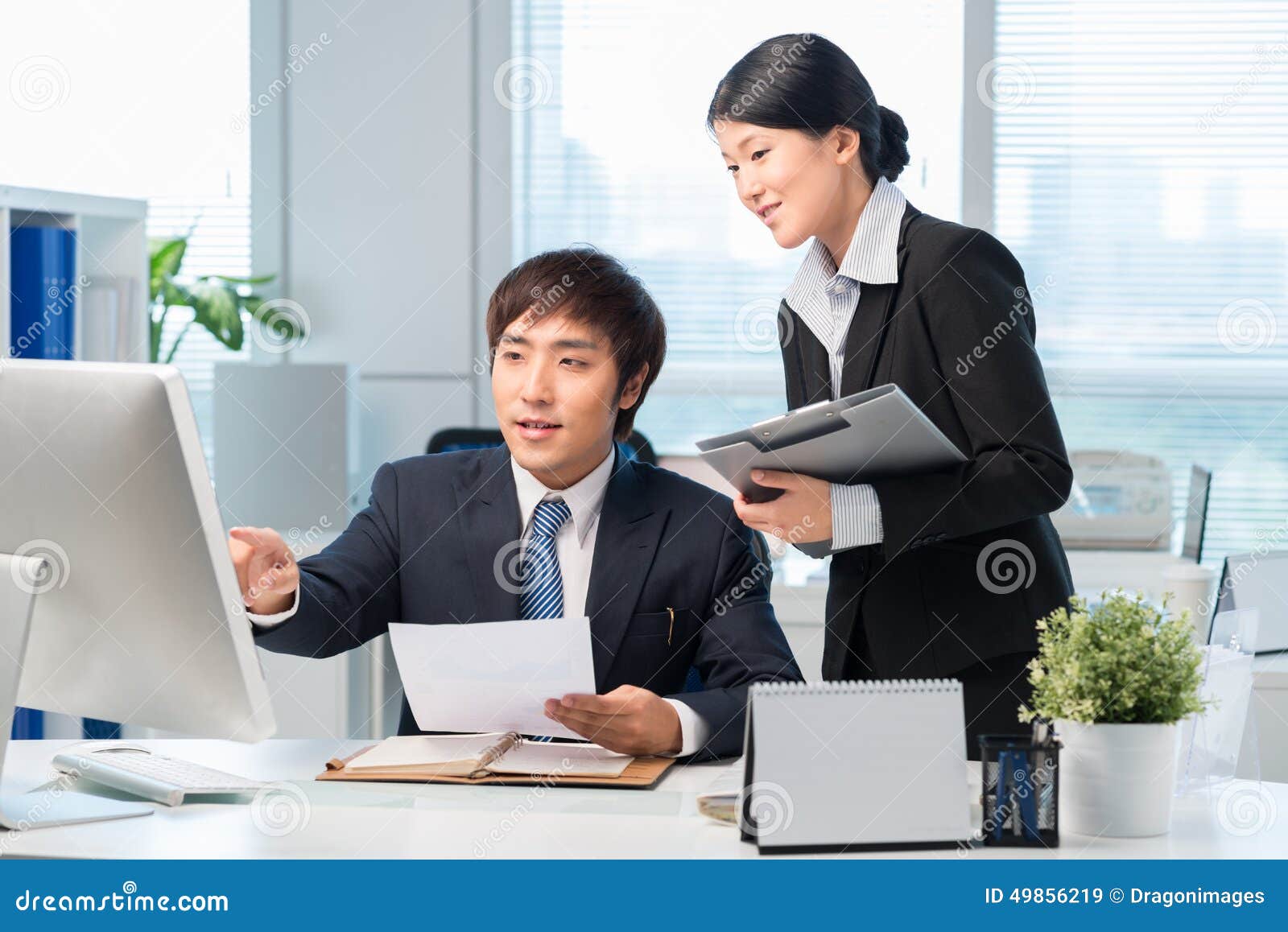 Korean Manager and His Assistant Stock Image - Image of screen ...