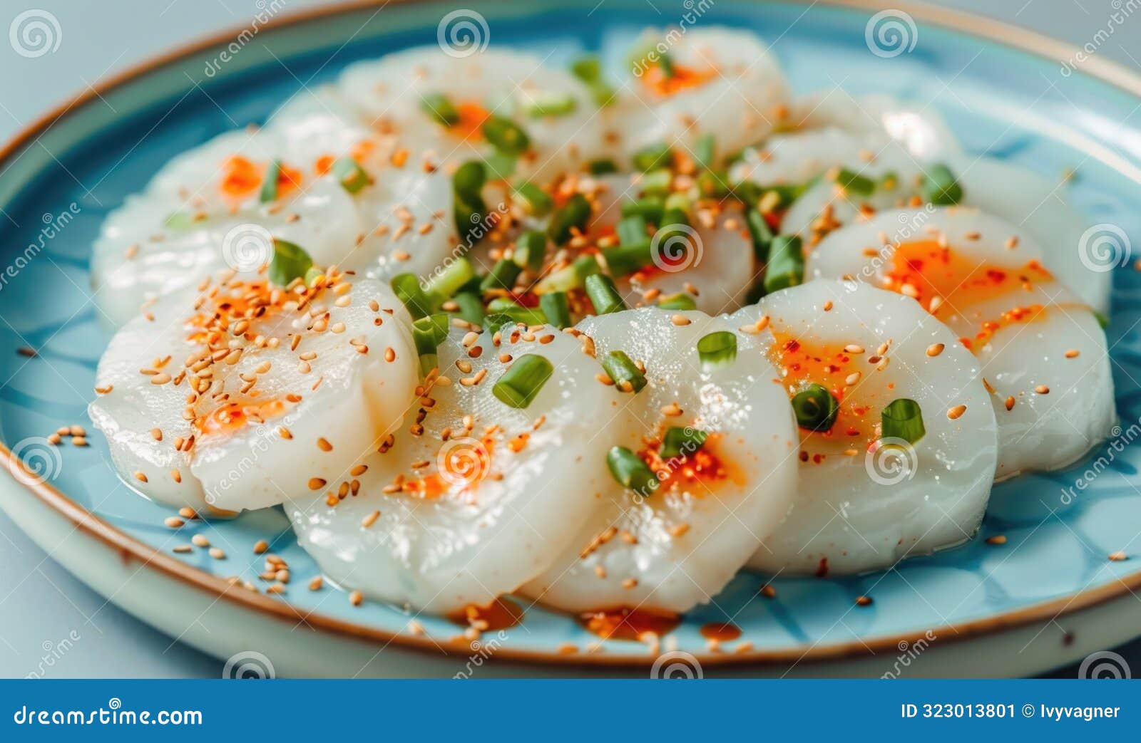 Korean Steamed Rice Cakes (tteok) on a Light Blue Background Stock ...