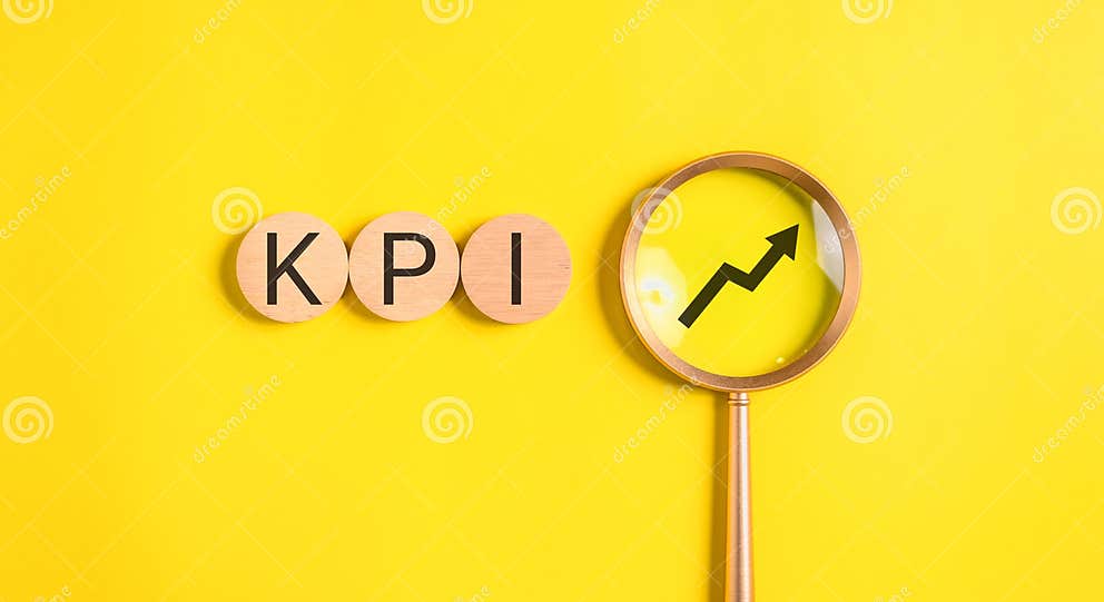 Key Performance Indicator Businessman Holding Wooden Cube With Kpi