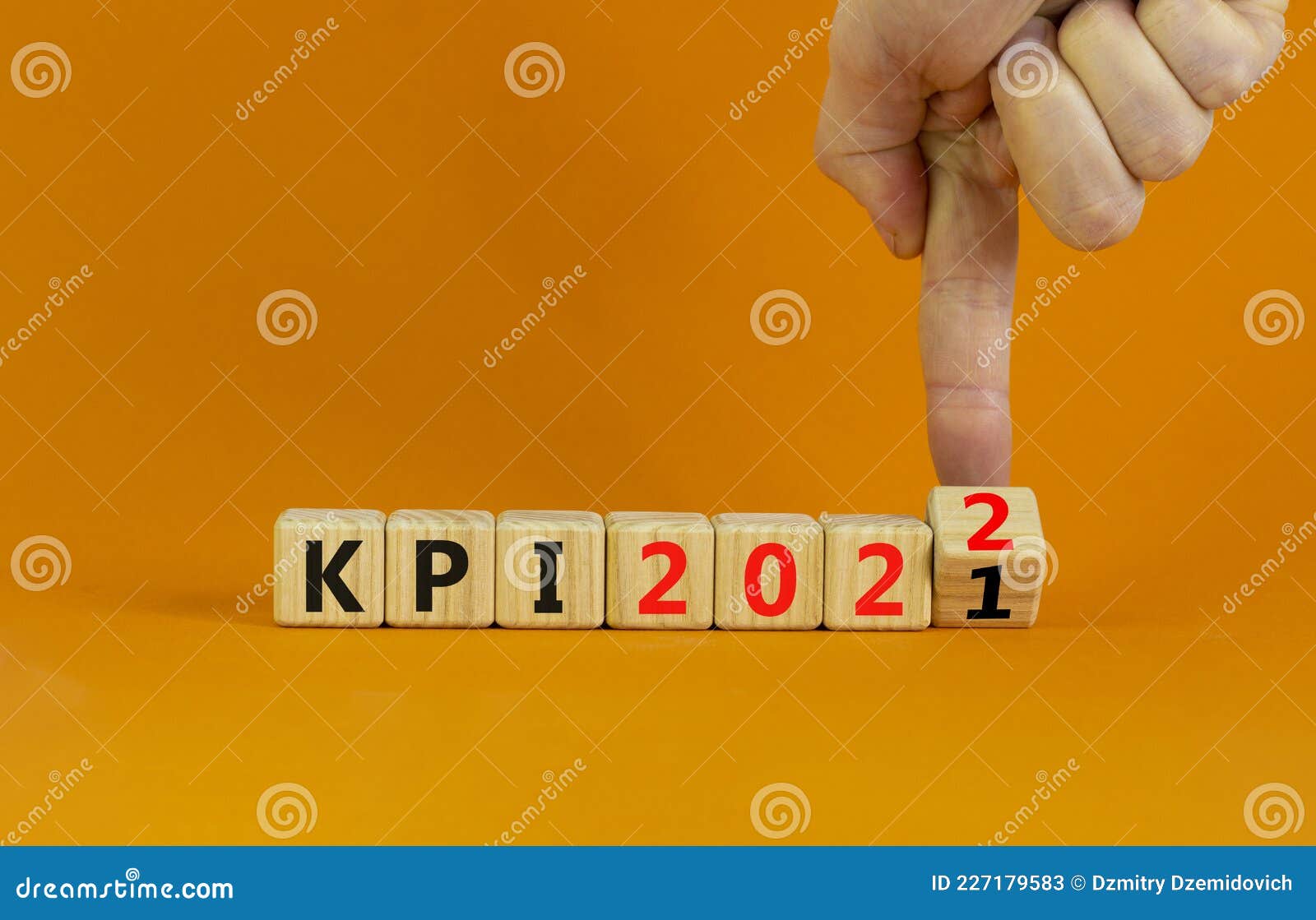 Kpi Key Performance Indicator Symbol Businessman Turns Wooden Cubes
