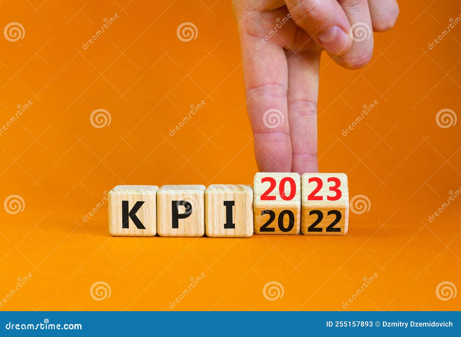Kpi Key Performance Indicator Symbol Businessman Turns Wooden Cubes
