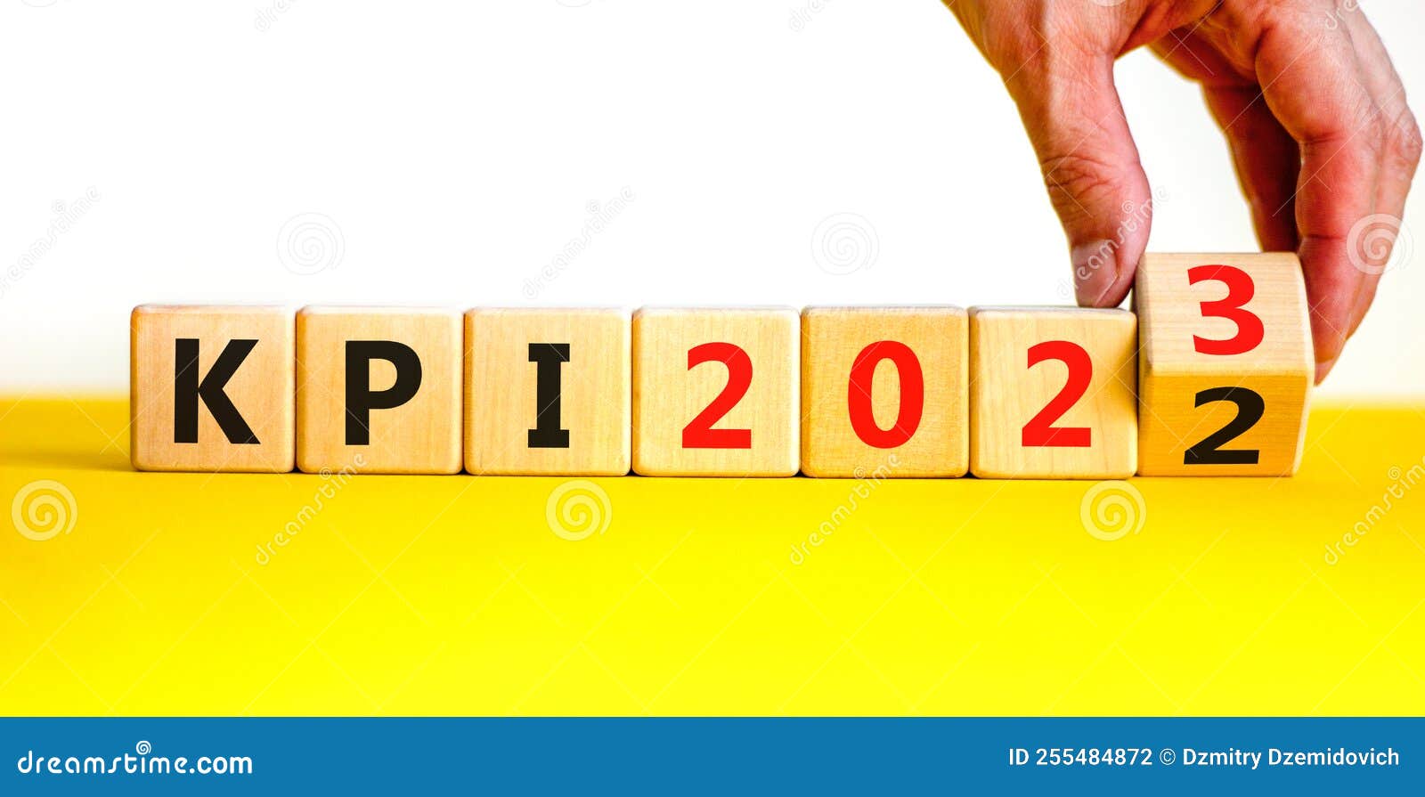 KPI, Key Performance Indicator Symbol. Businessman Turns Wooden Cubes ... KPI, Key Performance Indicator Symbol. Businessman Turns Wooden Cubes ...