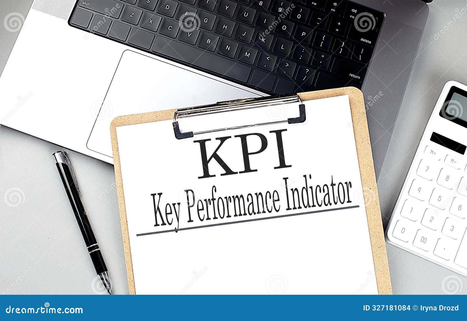 KPI Word on Clipboard on Laptop with Calculator and Pen Stock Photo ...