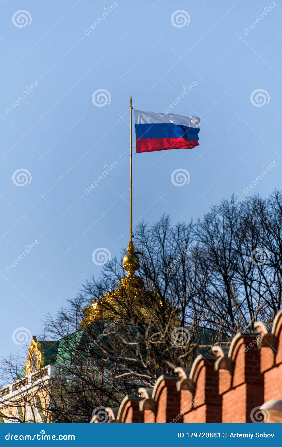 The Kremlin Wall and the Russian Flag on the Building of the Grand ...