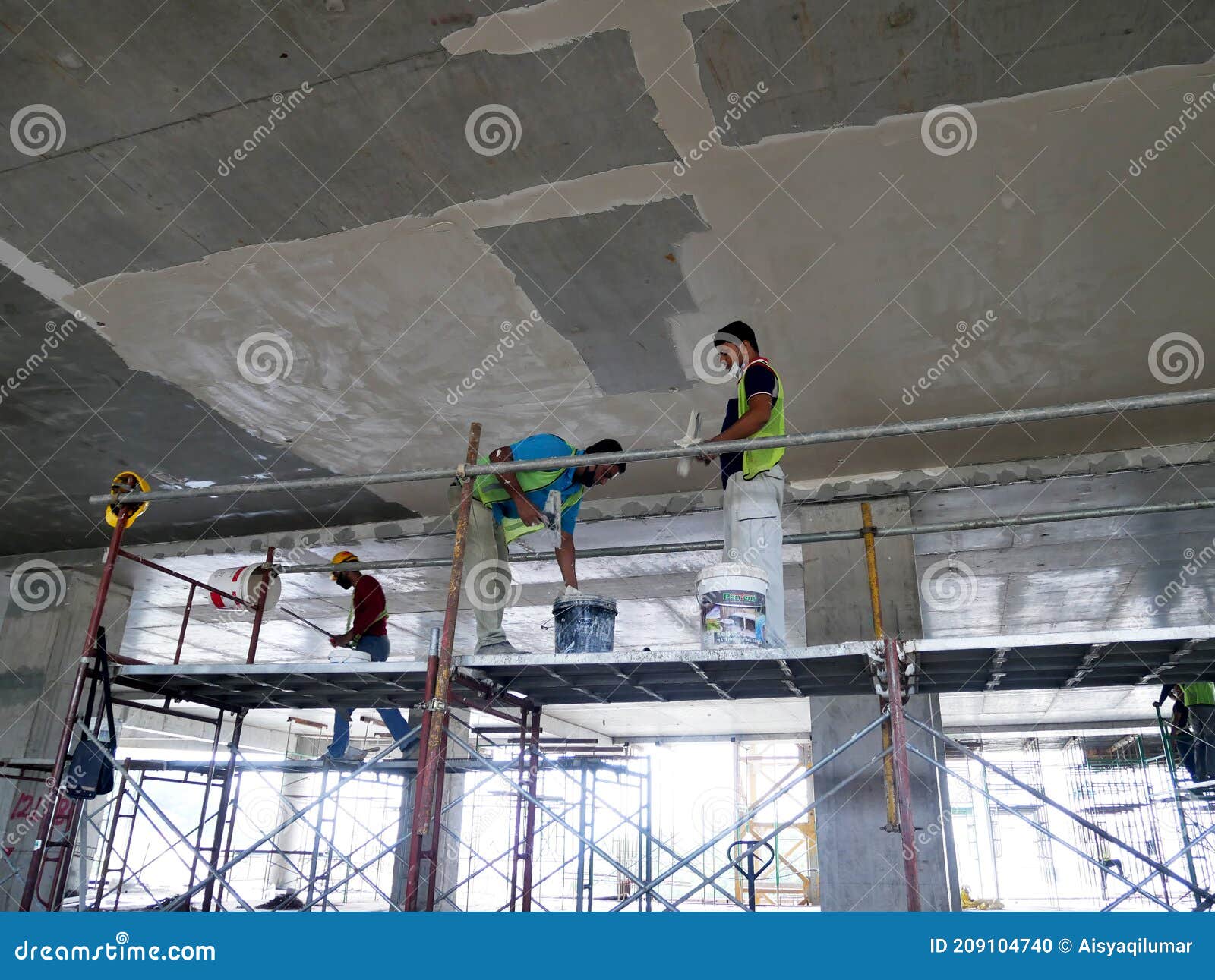 Construction Site Workers are Doing Ceiling Soffit Skim Coat Work at ...