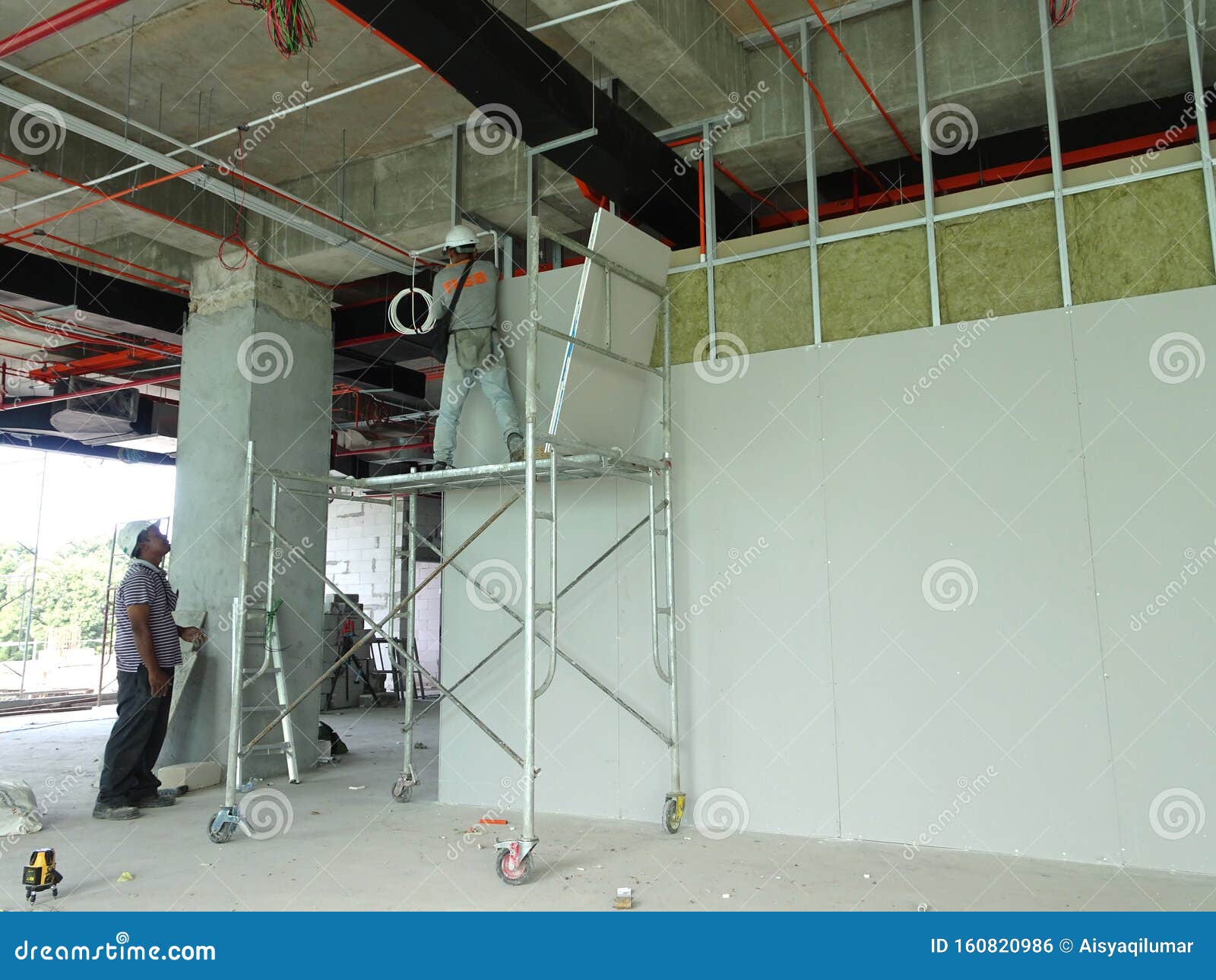 Drywall Installation Work in Progress by Construction Workers at the ...