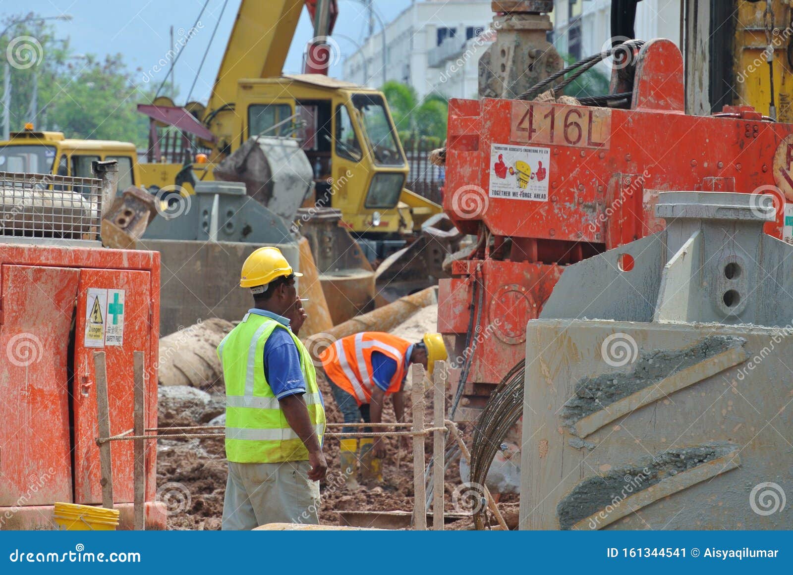 Construction Workers at the Construction Site Doing the daily Routine ...