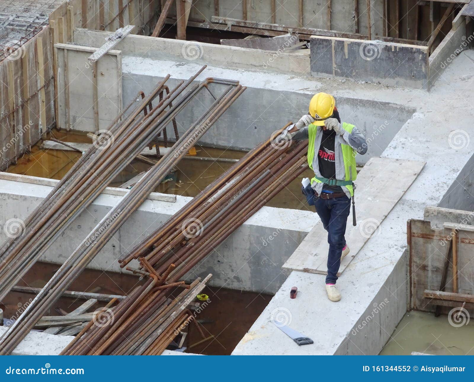 Construction Workers at the Construction Site Doing the daily Routine ...
