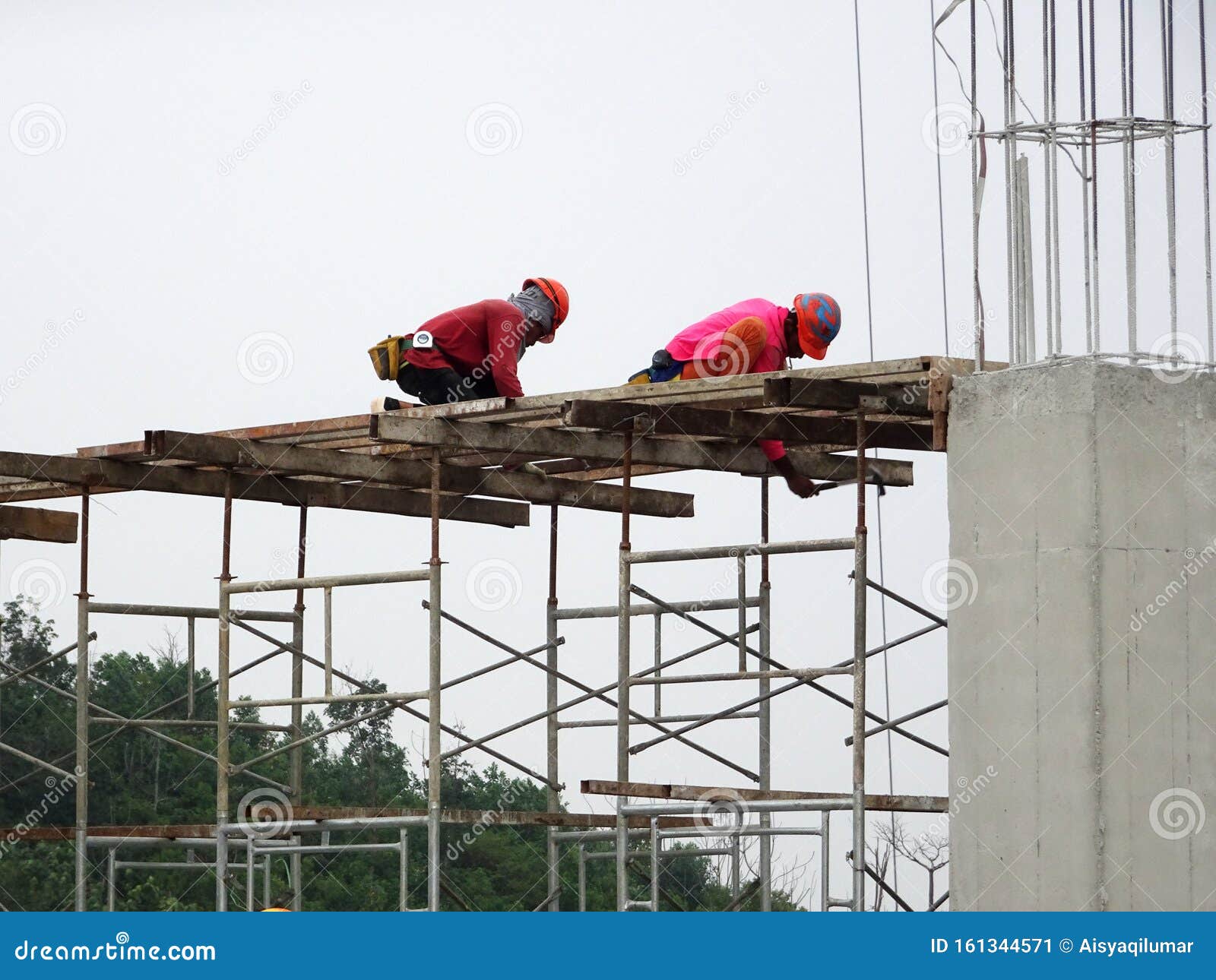 Construction Workers at the Construction Site Doing the daily Routine ...