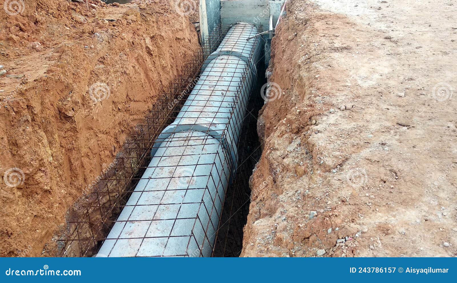 Construction Workers Install Concrete Pipe Culvert in the Underground ...