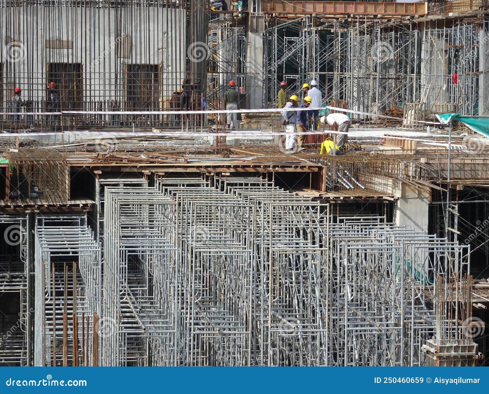 Construction Workers Working at Height at the Construction Site ...