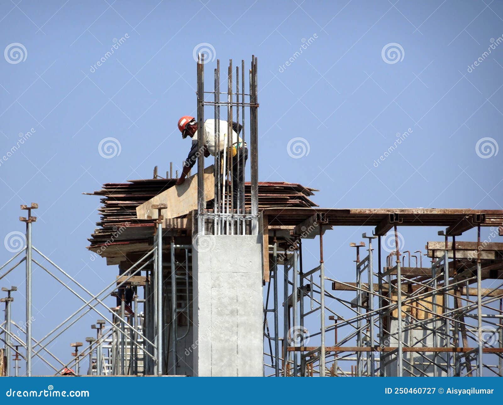 Construction Workers Working at Height at the Construction Site ...