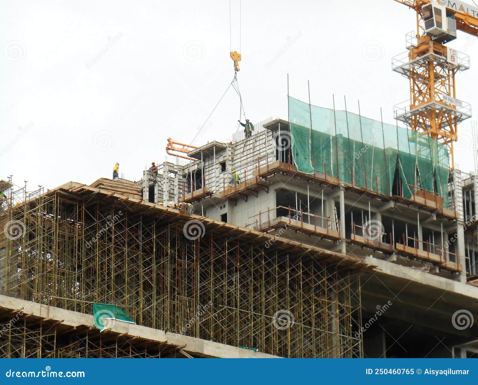 Construction Workers Working at Height at the Construction Site ...
