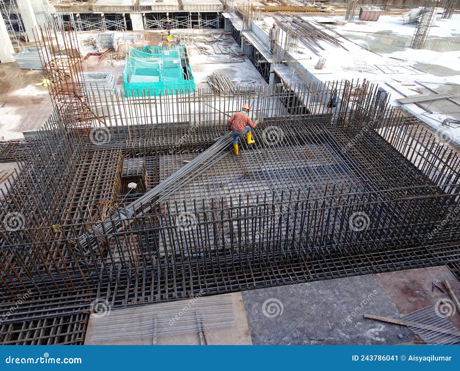 Construction Workers Installing Reinforcement Bar at the Construction ...