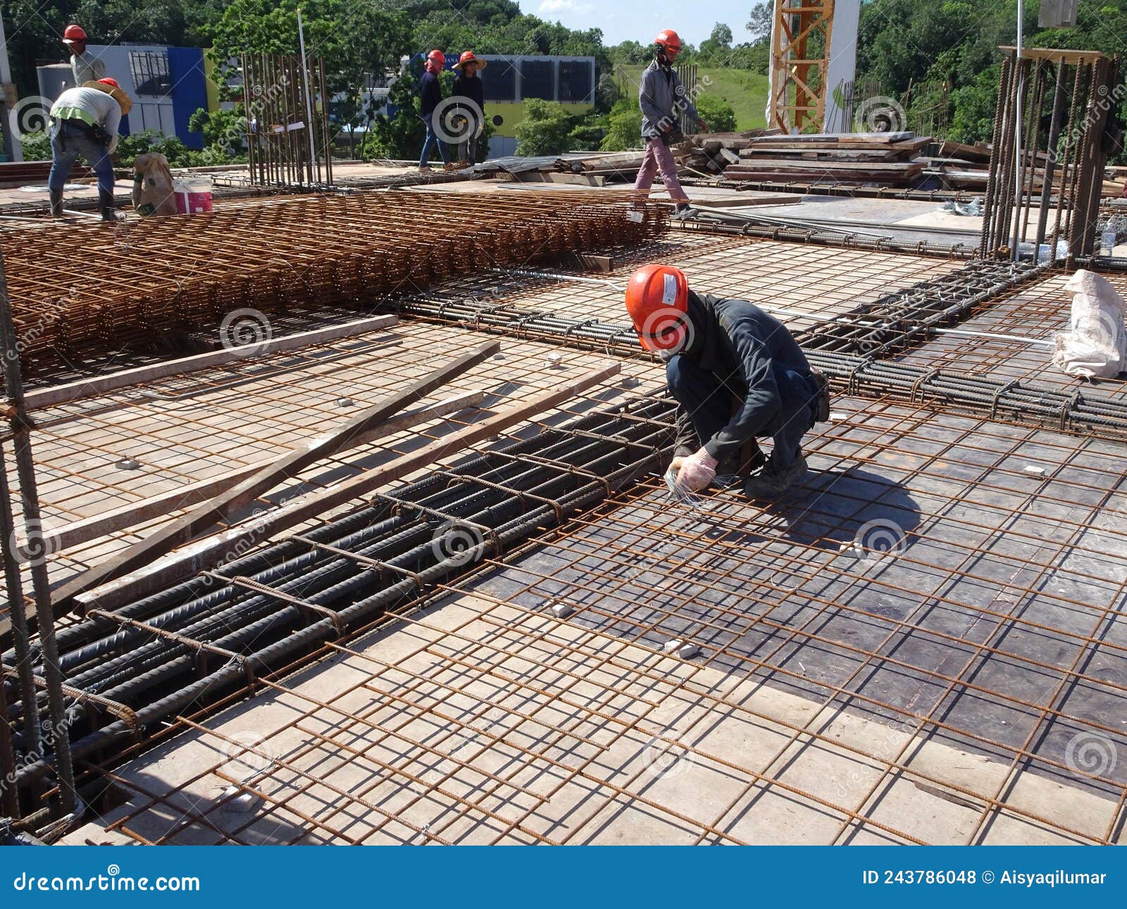 Construction Workers Installing Reinforcement Bar at the Construction ...
