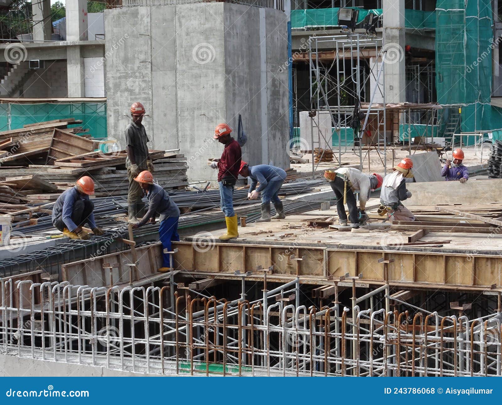 Construction Workers Installing Reinforcement Bar at the Construction ...