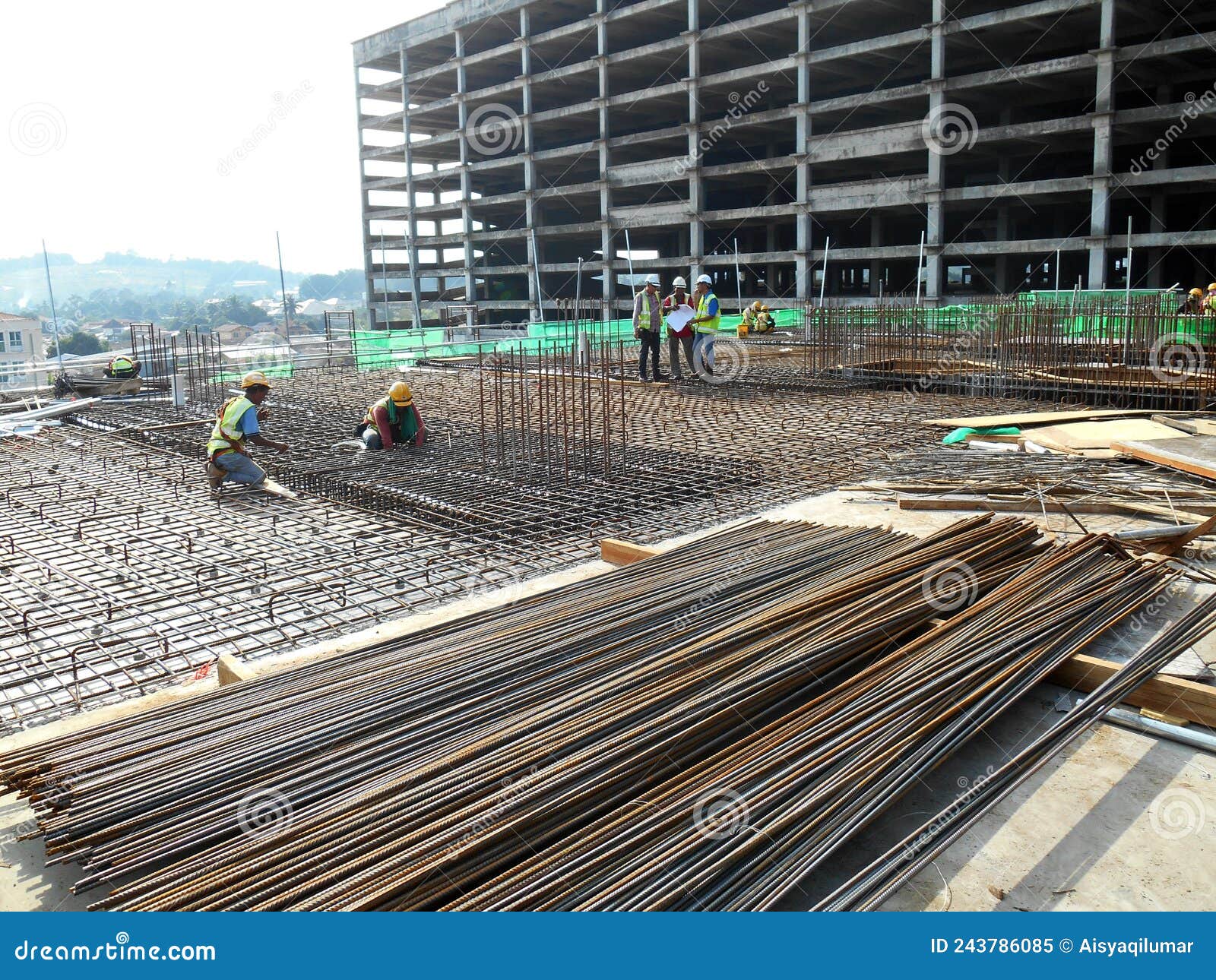 Construction Workers Installing Reinforcement Bar at the Construction ...