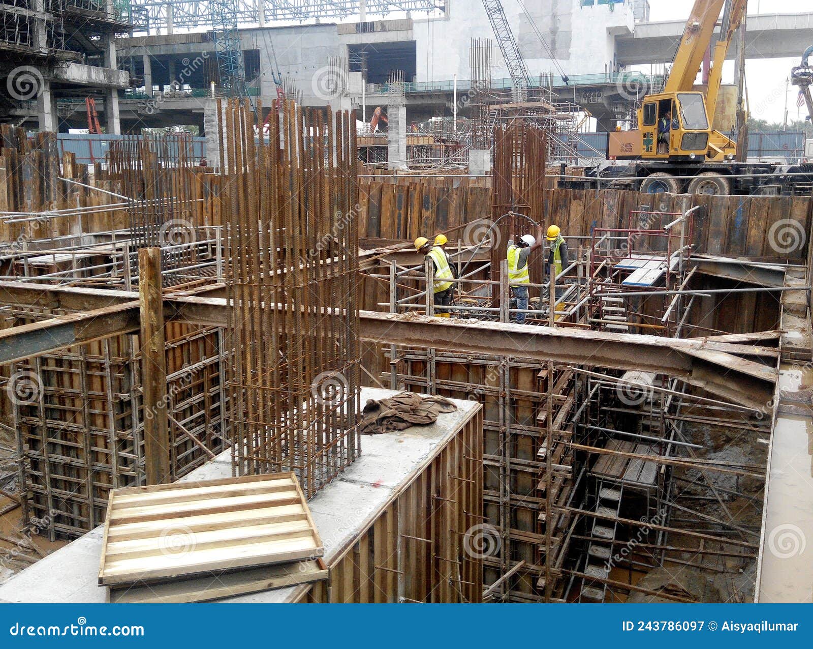Construction Workers Installing Reinforcement Bar at the Construction ...