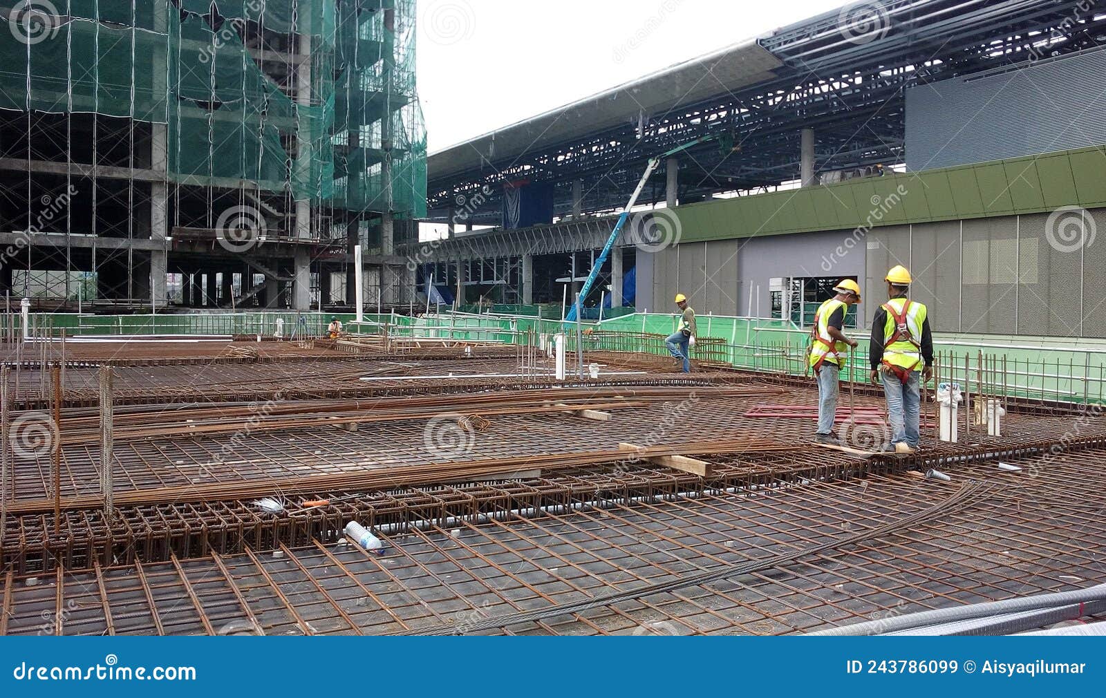 Construction Workers Installing Reinforcement Bar at the Construction ...