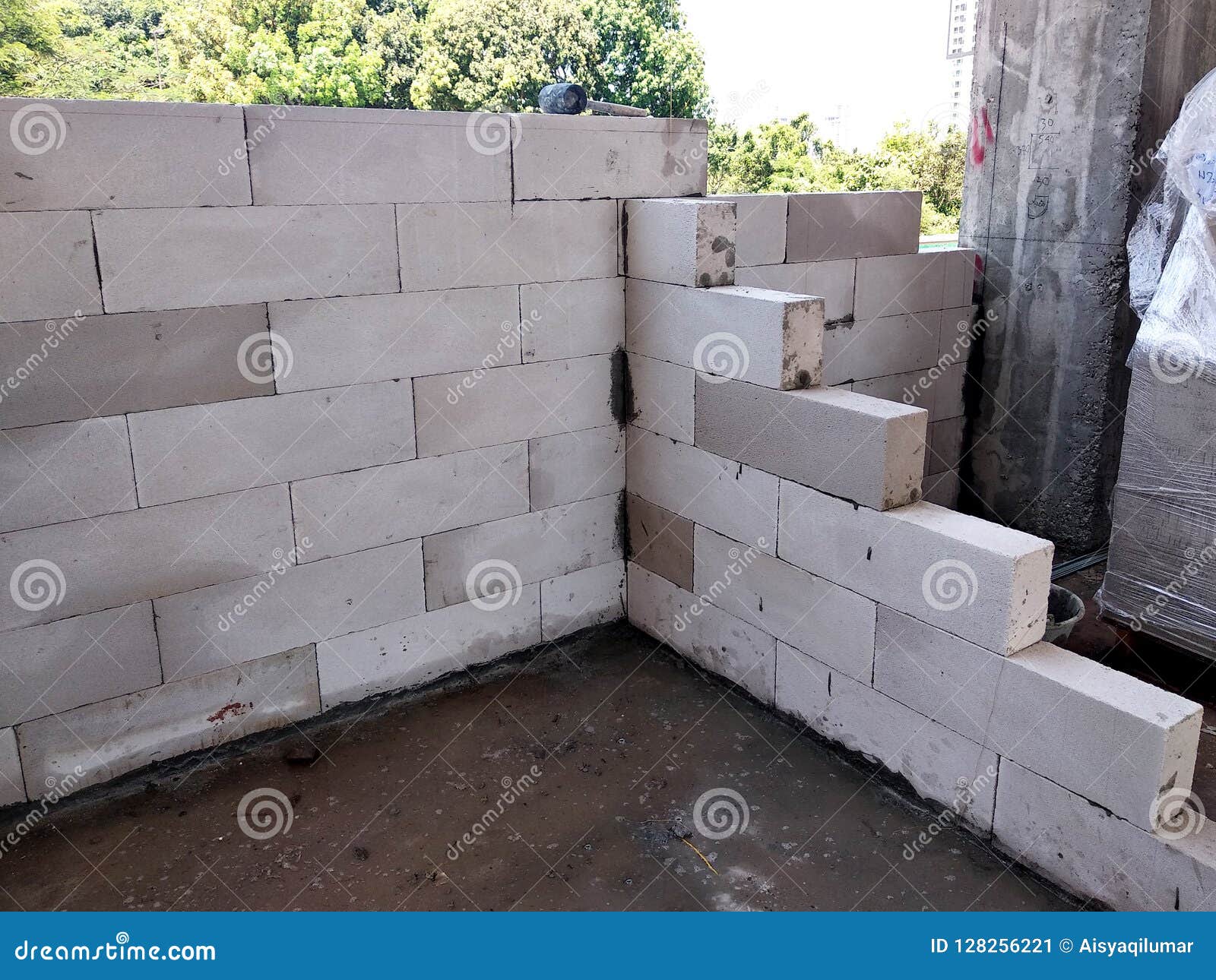 Brickwork By Construction Workers At The Construction Site. Editorial ...