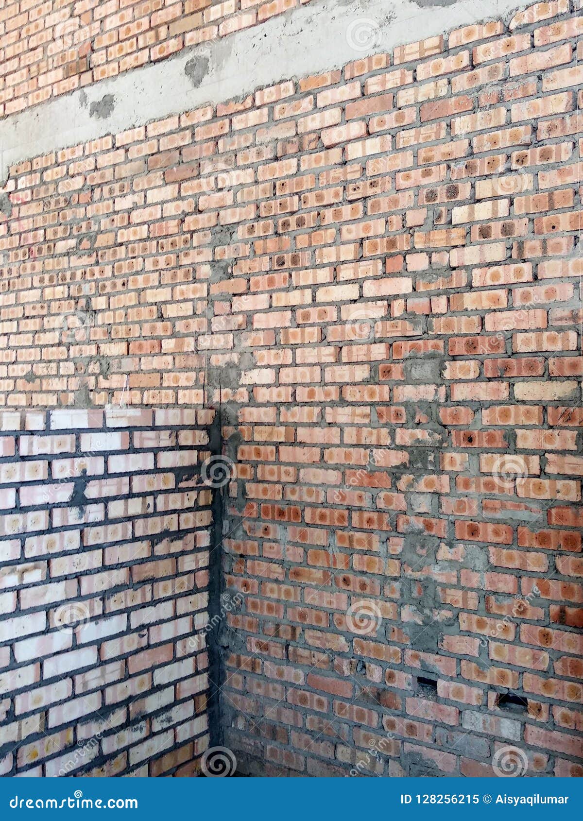 Brickwork by Construction Workers at the Construction Site. Editorial ...