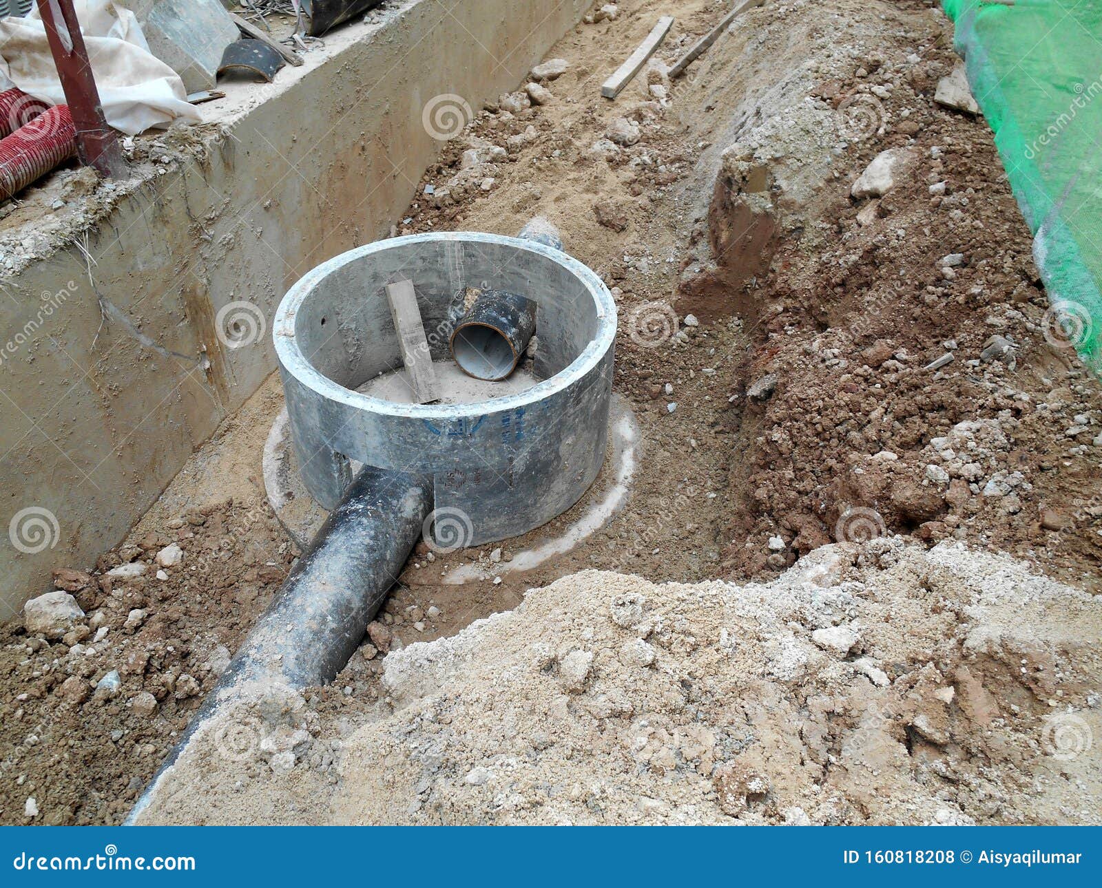 Underground Drainage Manhole Under Construction by Construction Workers ...
