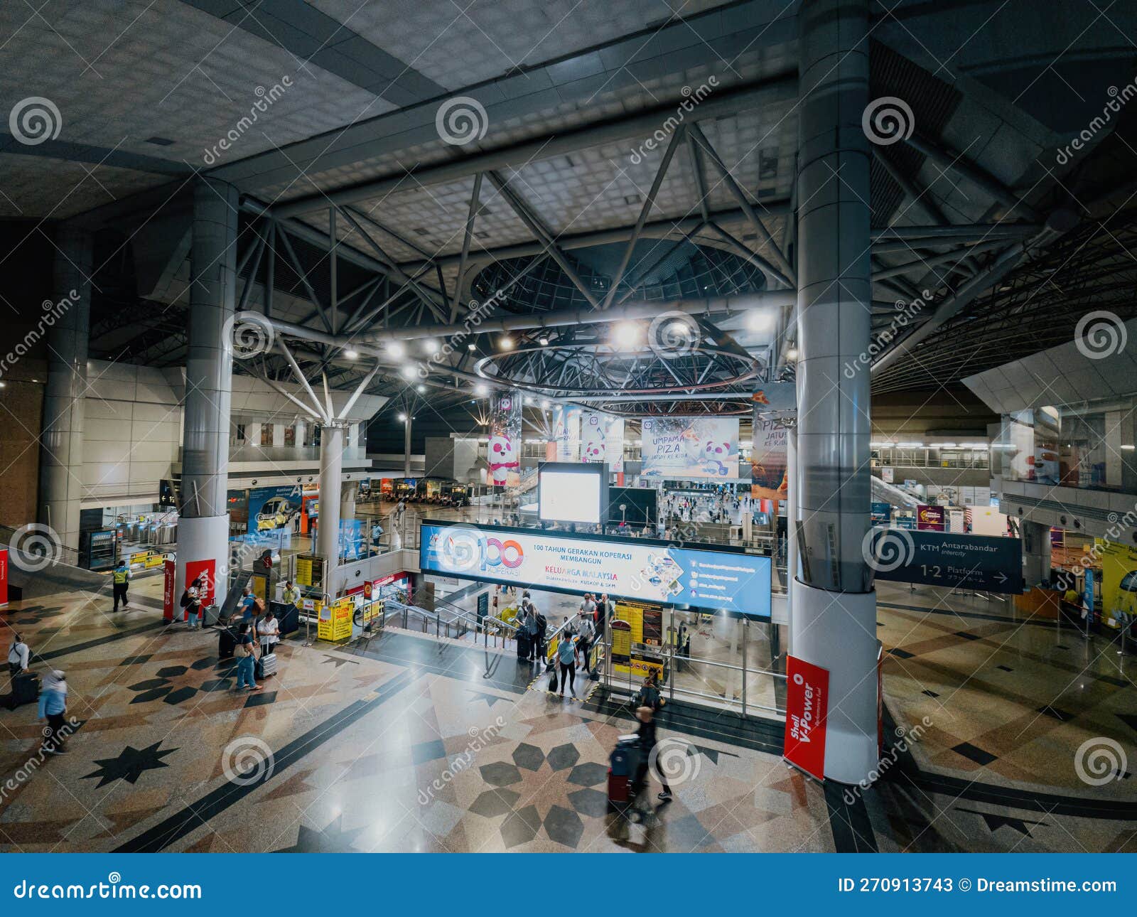 Kuala Lumpur, Malaysia - Oct 22, 2022 Commuters in KL Sentral ...