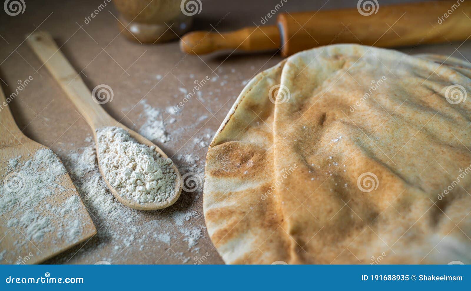 Kuboos or Khubz - Arabic Bread on a Brown Table in the Kitchen Stock ...