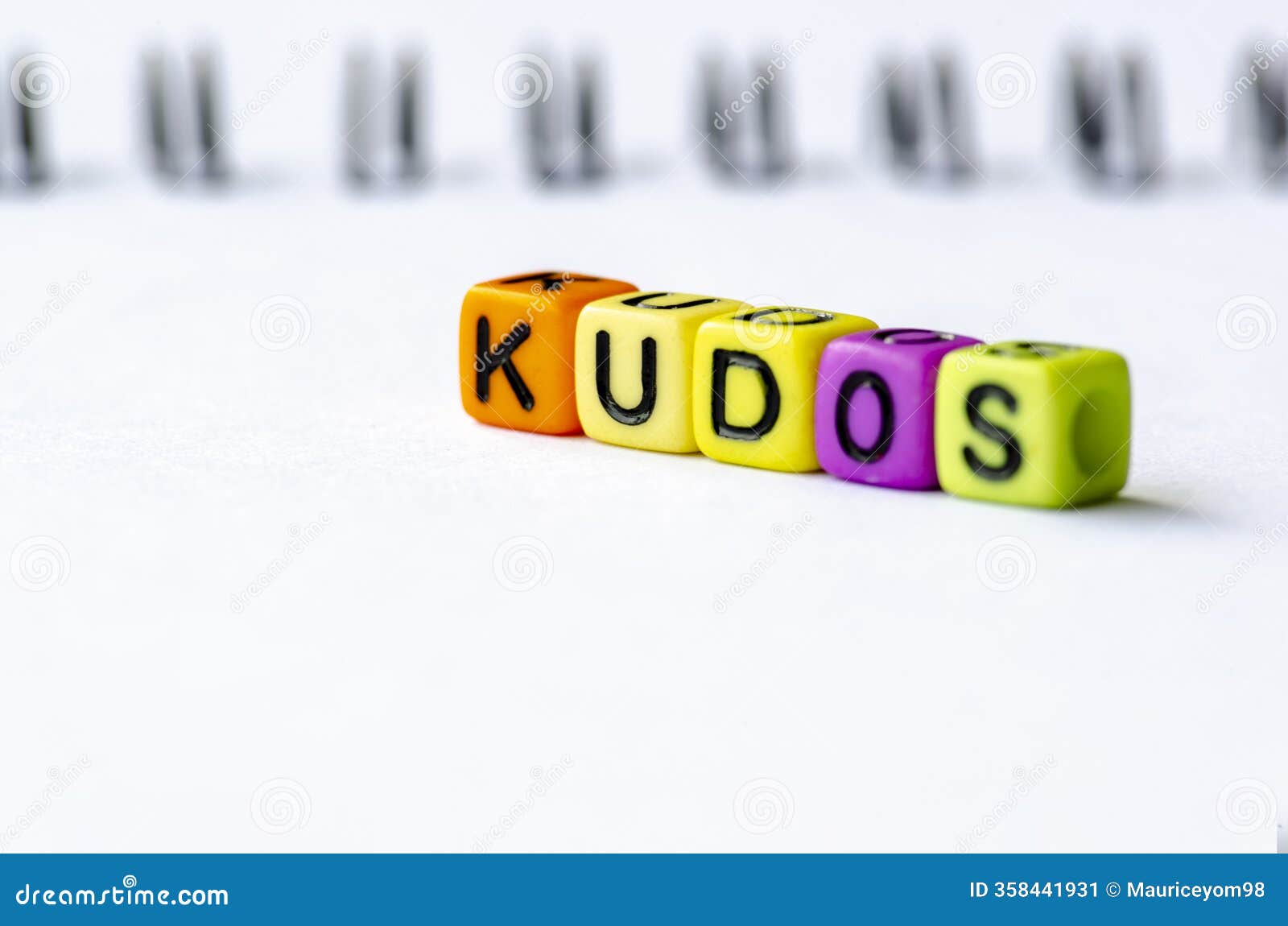 KUDOS Text on Colorful Plastic Alphabet Beads Stock Image - Image of ...