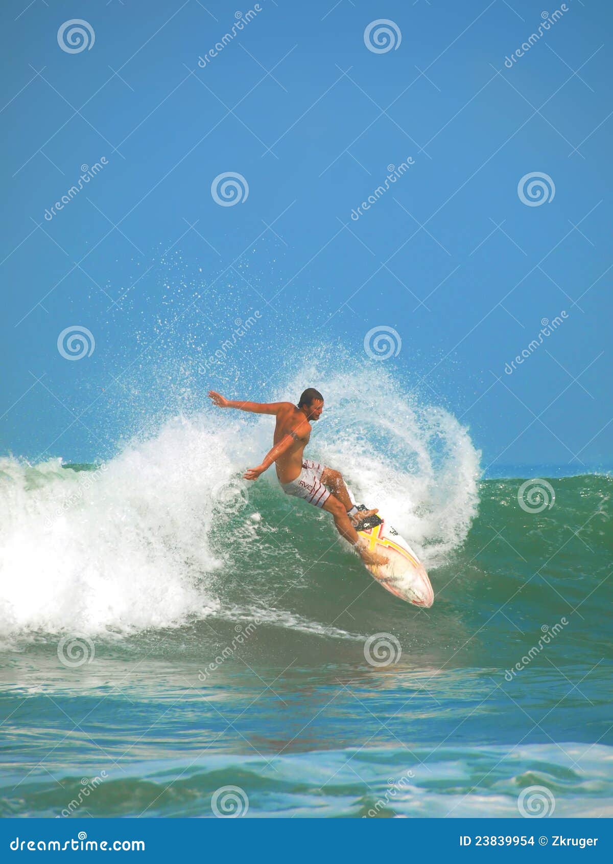 Kuta beach surfing action editorial stock image. Image of travel - 23839954