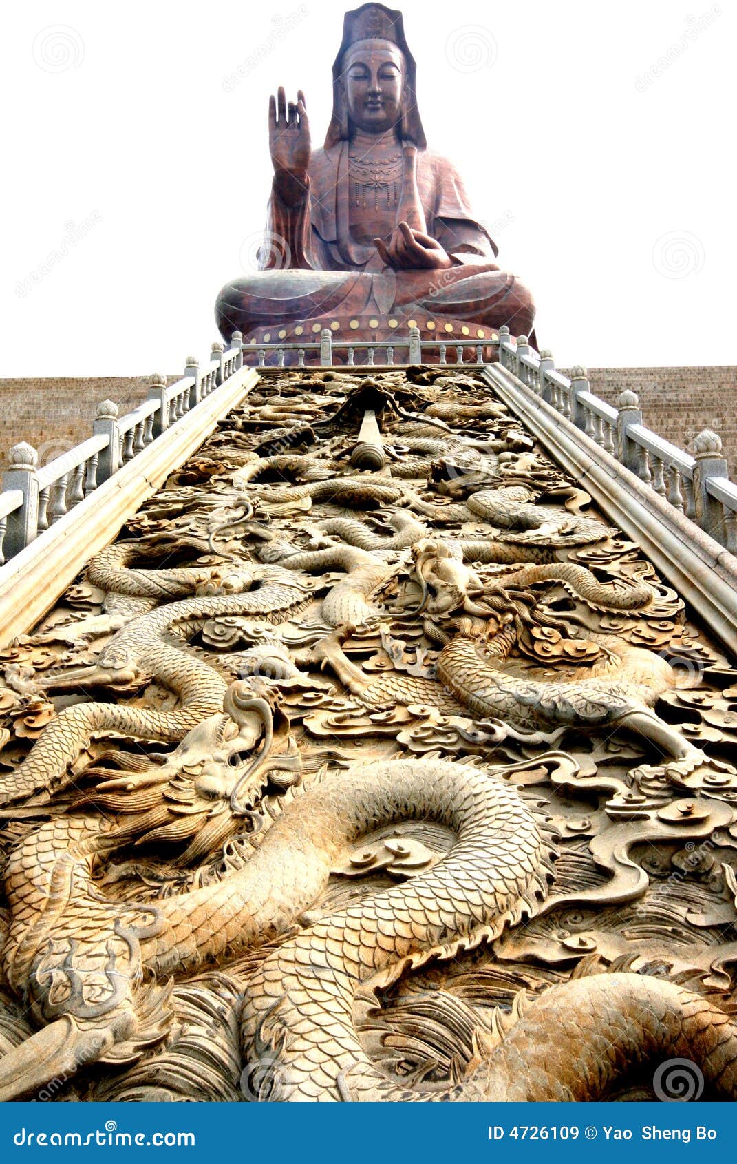 Kwan-yin statue and dragon stock image. Image of seating - 4726109