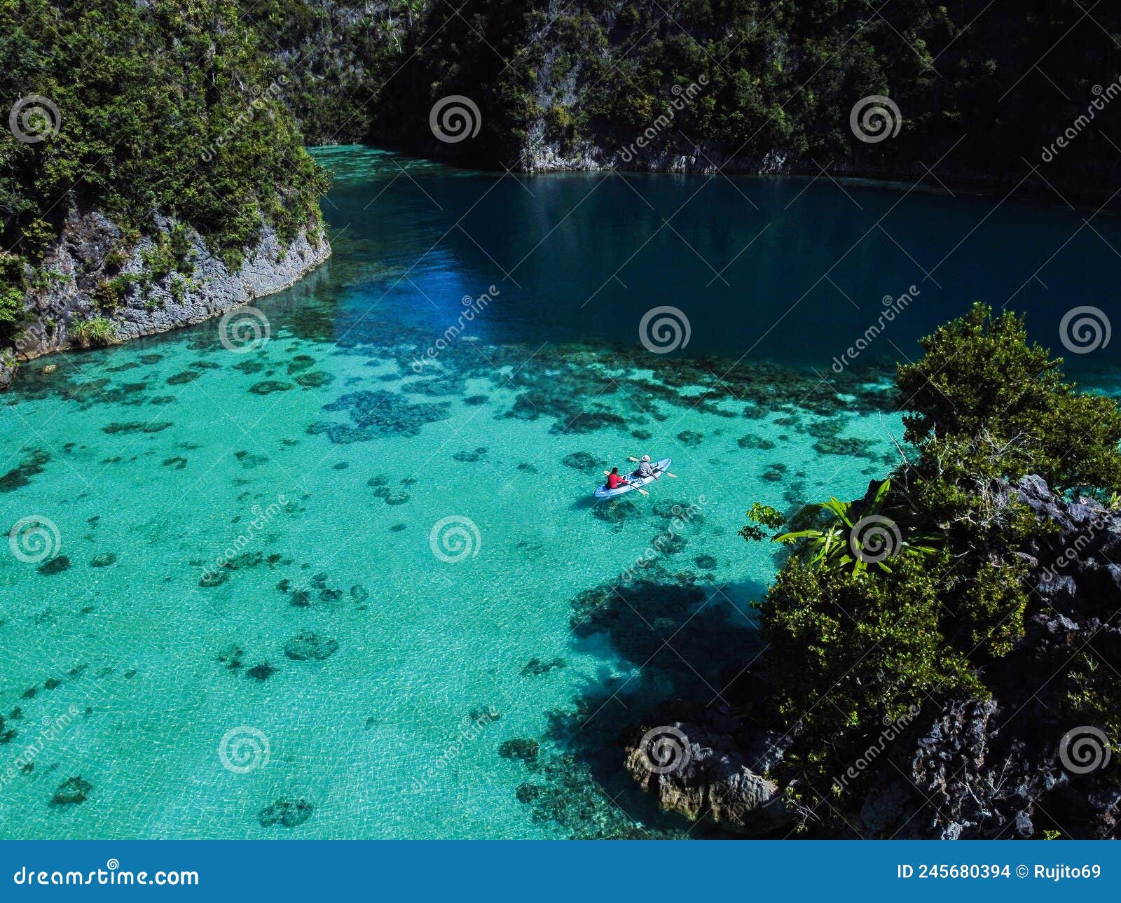Kyaking in Raja Ampat stock photo. Image of kayaking - 245680394