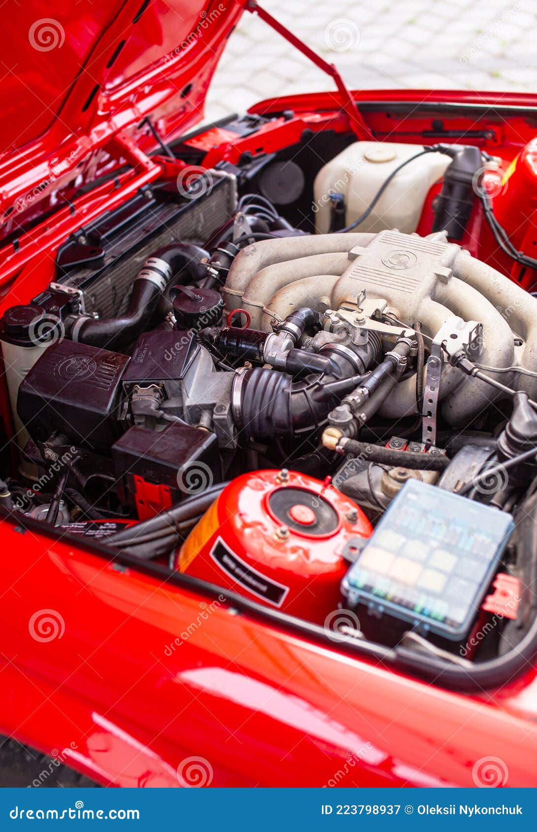 KYIV, UKRAINE - May 24, 2020: the Engine Compartment of a BMW E30 with ...