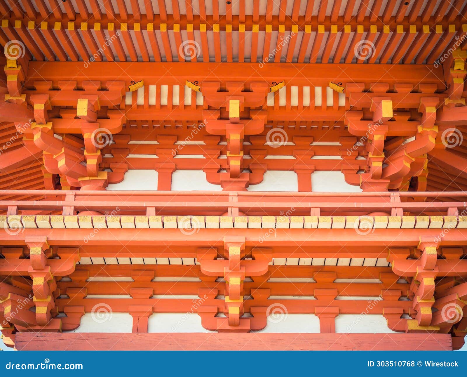 Close-up View of a Roof with Warm Red and Gold Beams and Columns Stock ...