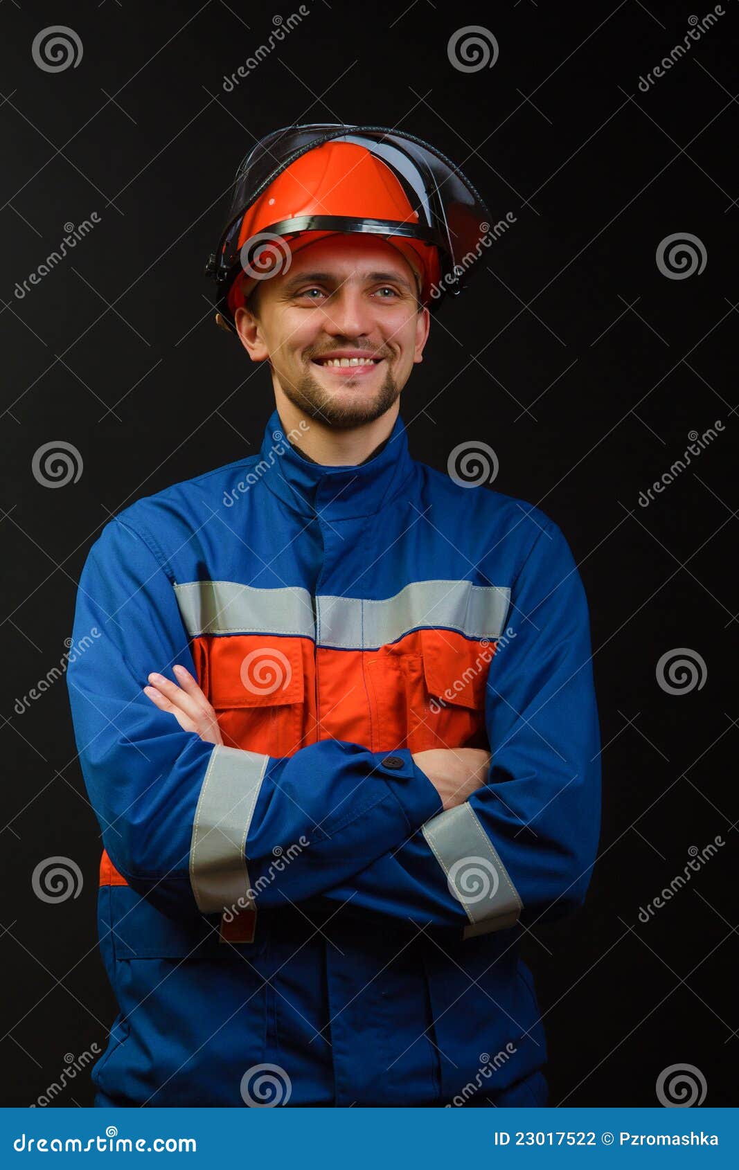 L'ouvrier Dans Les Combinaisons Et Un Casque Photo stock - Image du ...