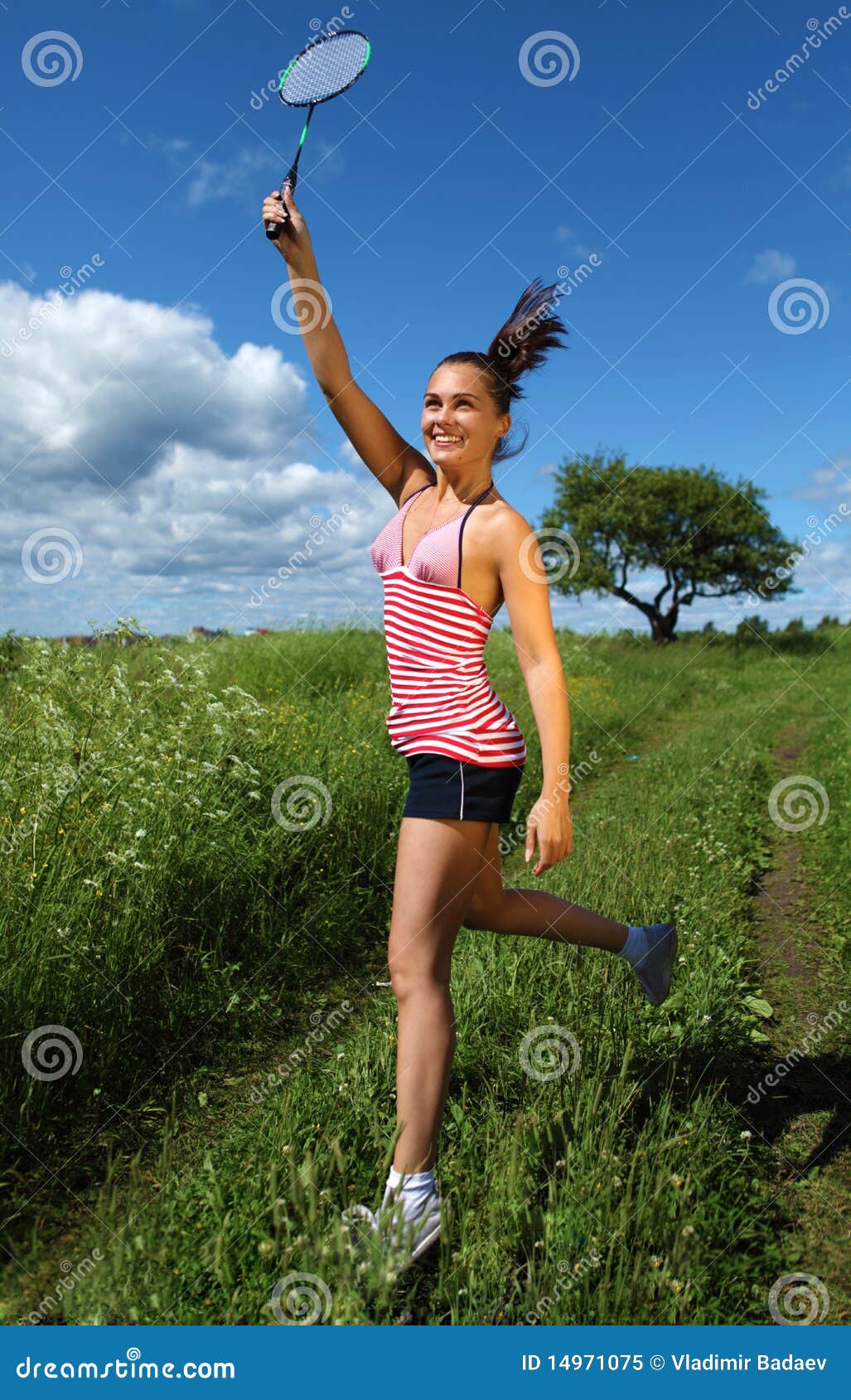 La Giovane Donna Gioca Il Volano Immagine Stock - Immagine di mano ...