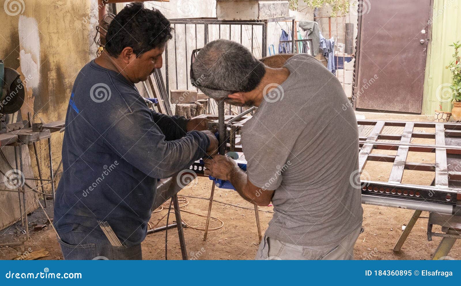 Blacksmith Working in a Backyard Workshop, La Paz, Baja California ...