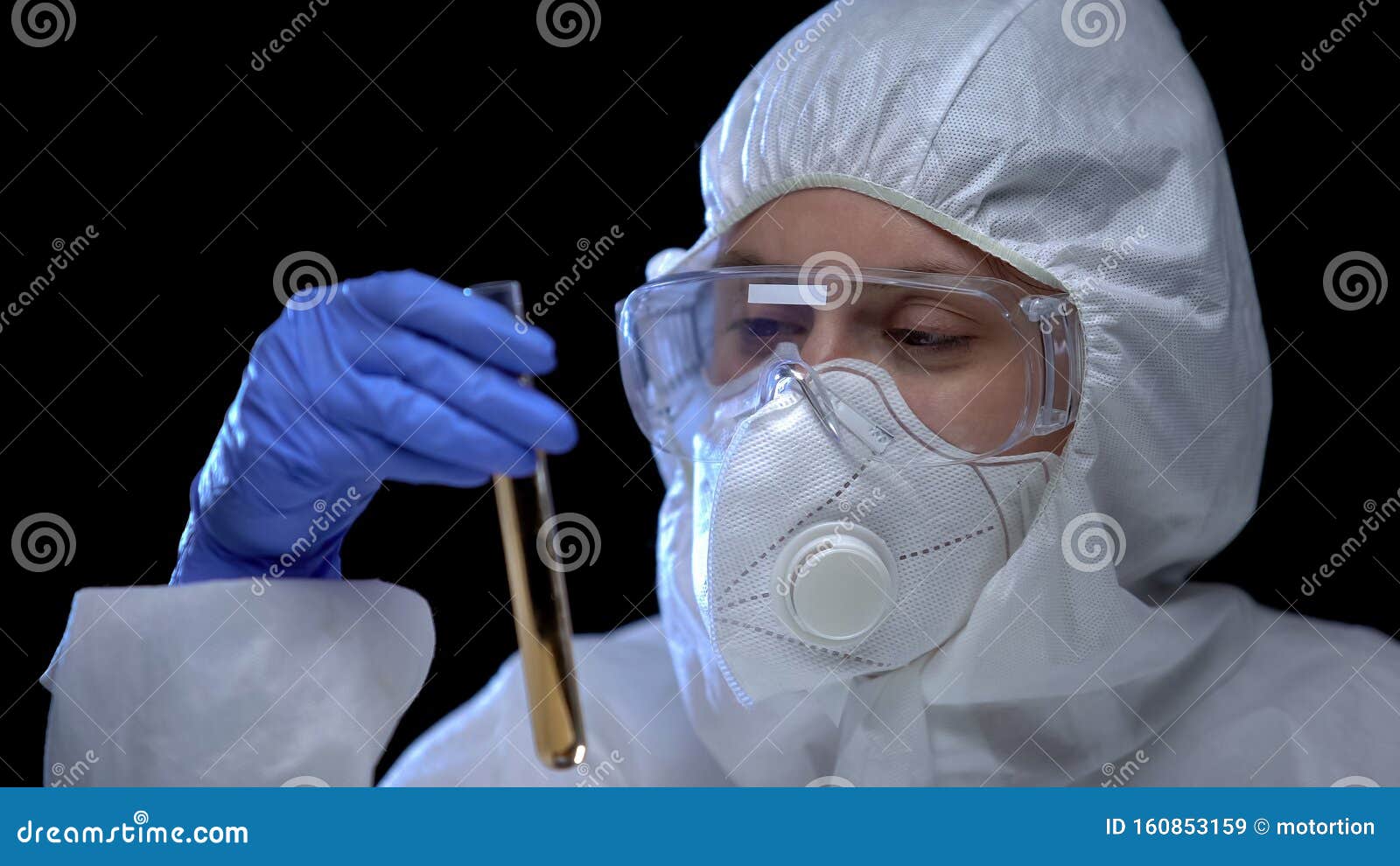 Lab Assistant in Protective Suit Studying Sample of Detergent, Research ...
