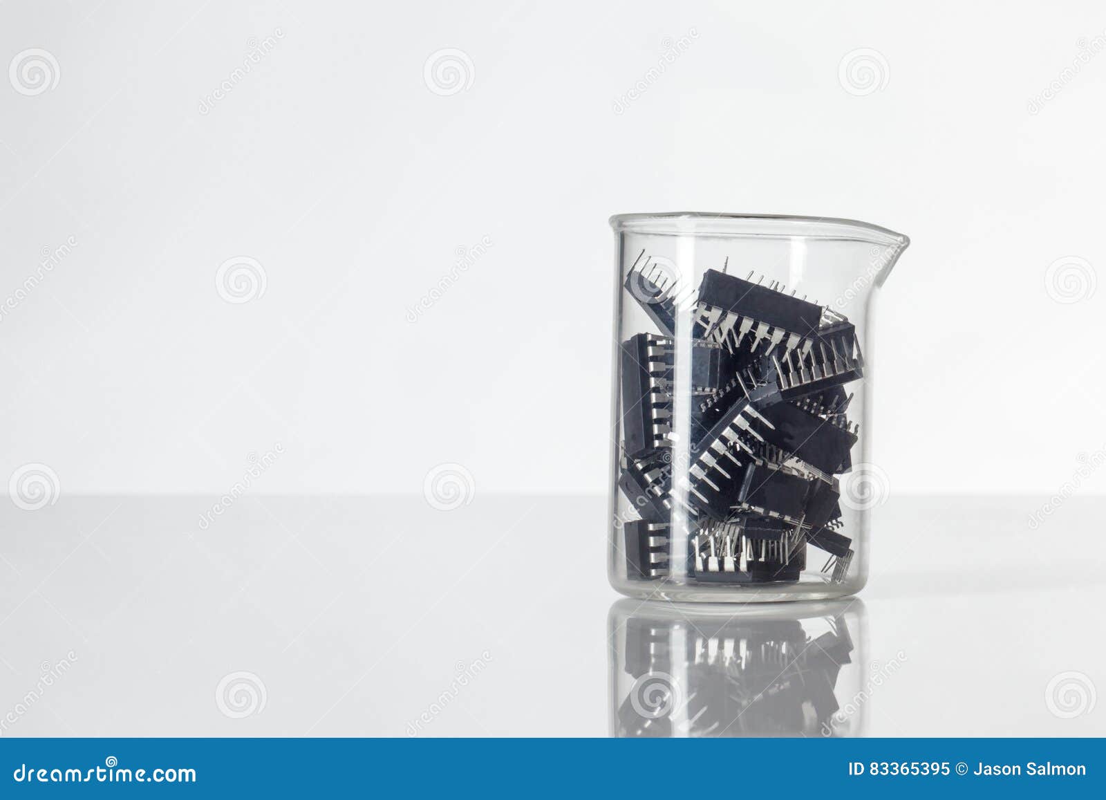 Lab Beaker Holding Many Chips Stock Image - Image of components ...