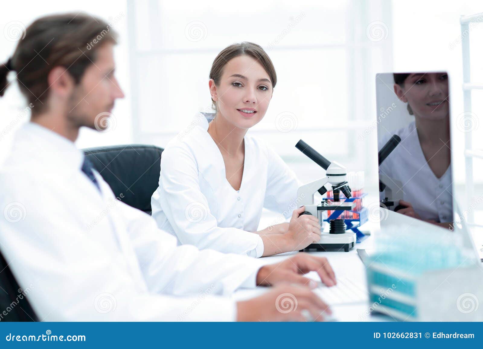 Lab Expert Working on a Test Using Microscope Stock Image - Image of ...