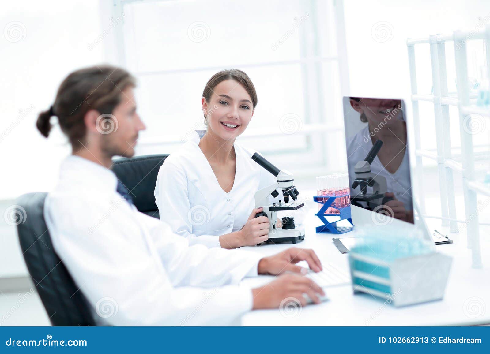 Lab Expert Working on a Test Using Microscope Stock Image - Image of ...