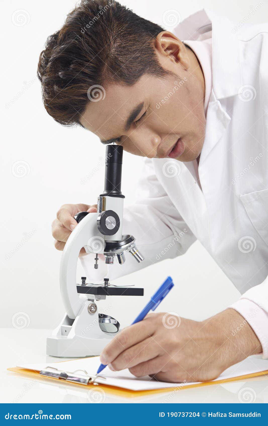 Lab Personnel Looking through a Microscope. Conceptual Image Stock ...